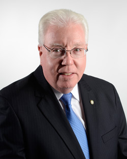 County Commissioner Charles Busler | Compass